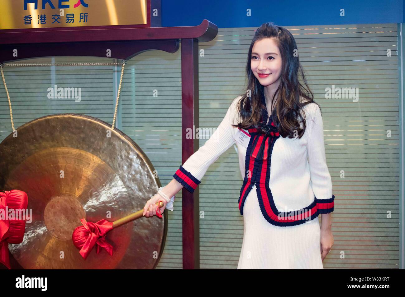 In this handout picture, Hong Kong model and actress Angelababy beats ...