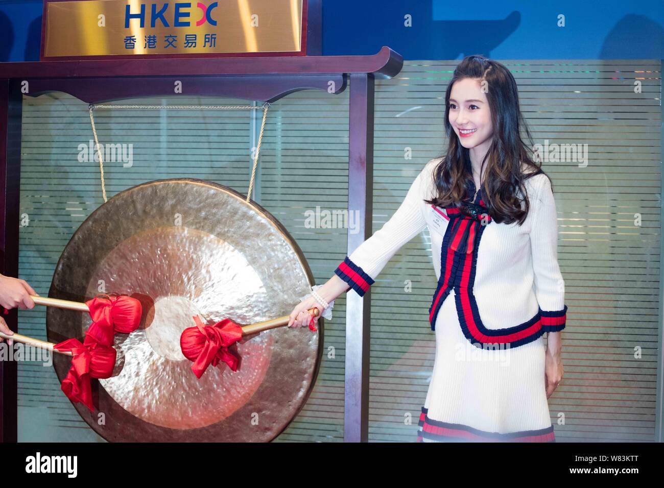 In this handout picture, Hong Kong model and actress Angelababy beats ...