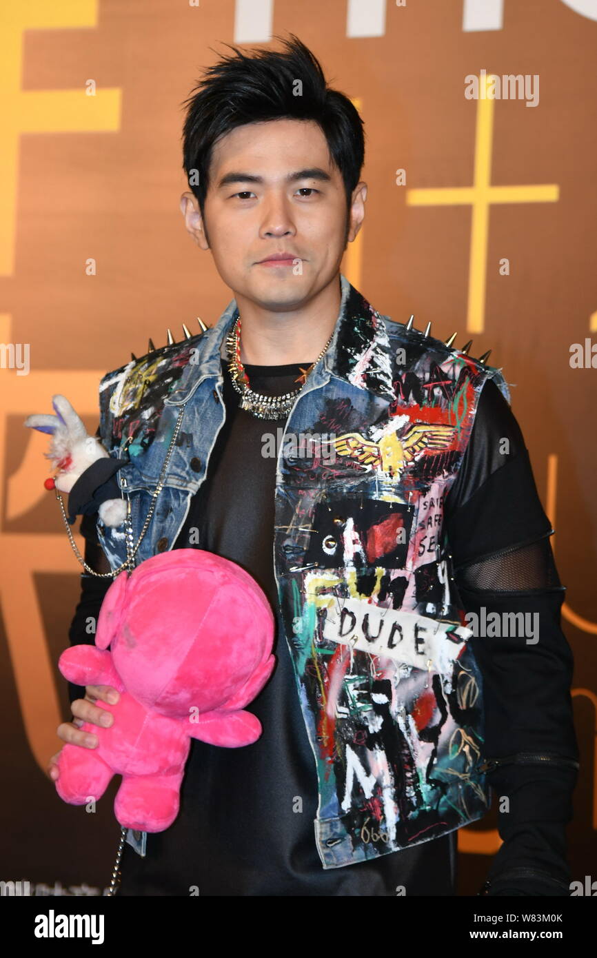 Taiwanese singer Jay Chou arrives on the red carpet for the 10th Migu ...