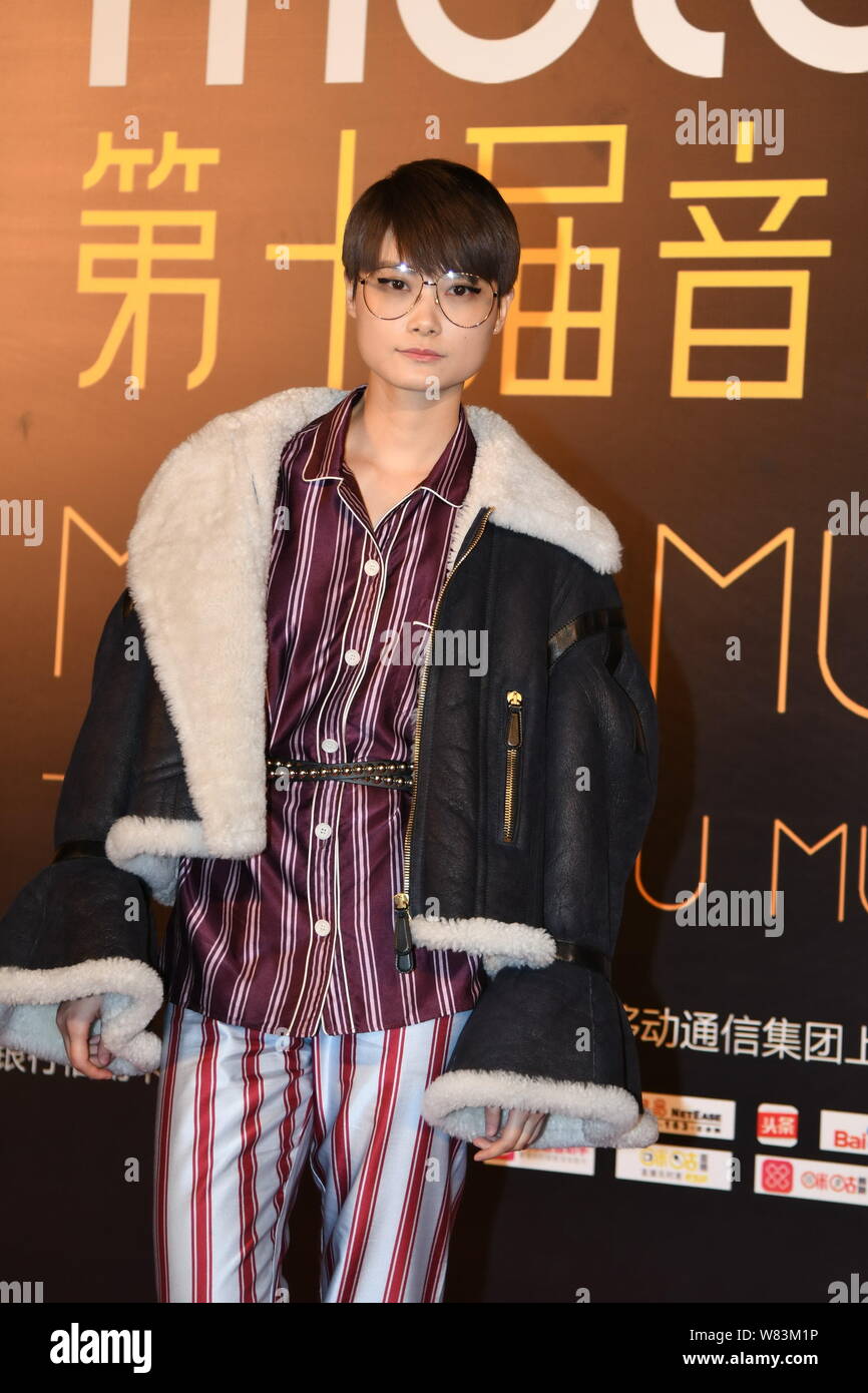 Chinese singer Chris Lee or Li Yuchun arrives on the red carpet for the ...