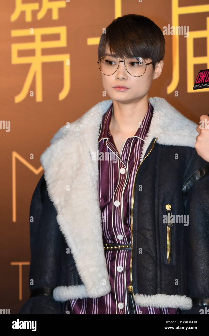 Chinese singer Chris Lee or Li Yuchun arrives on the red carpet for the ...