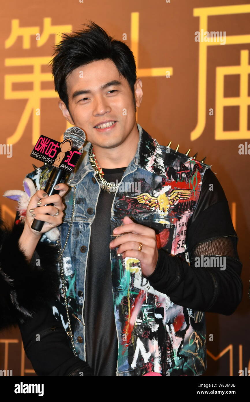 Taiwanese singer Jay Chou arrives on the red carpet for the 10th Migu ...