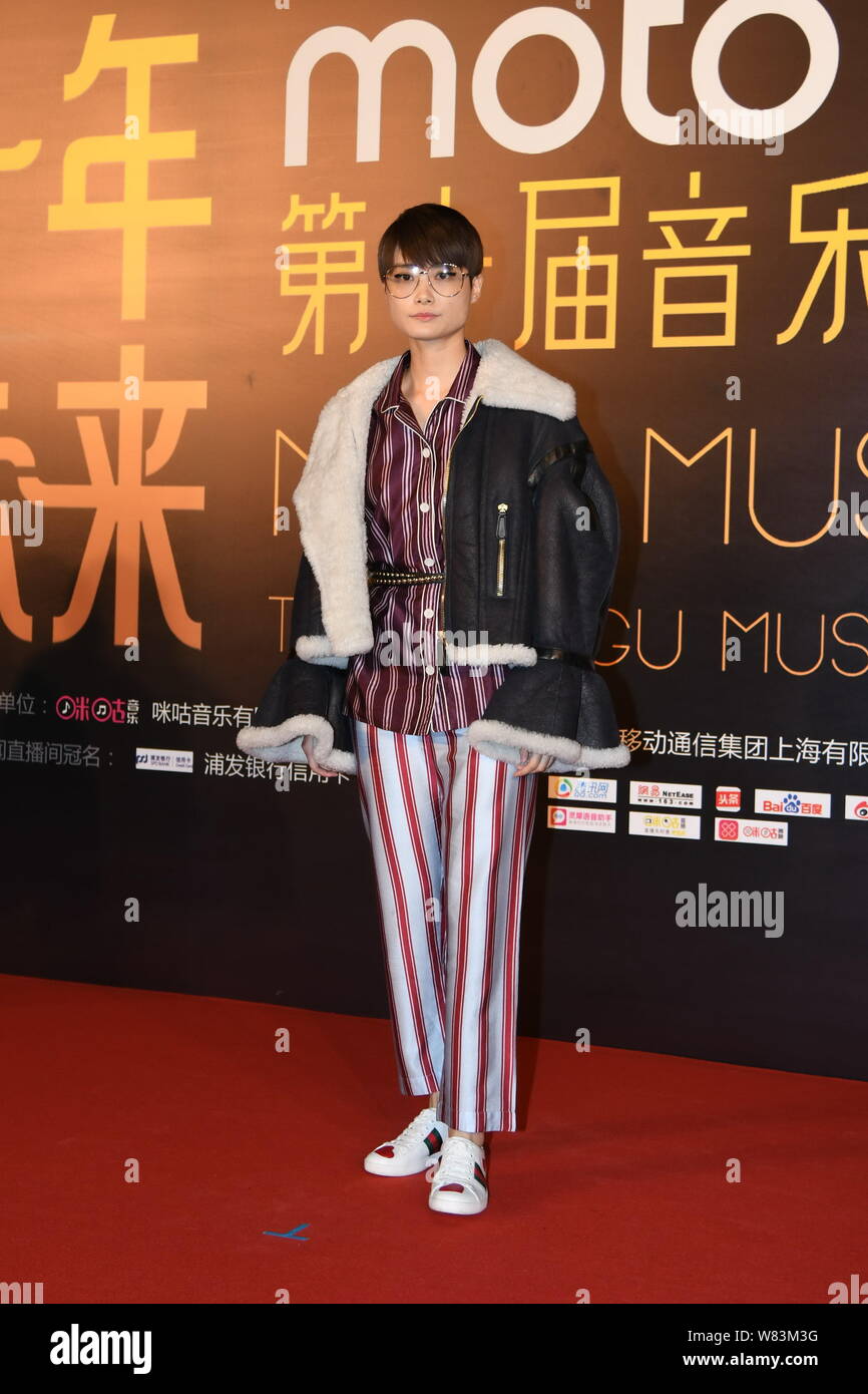 Chinese singer Chris Lee or Li Yuchun arrives on the red carpet for the ...