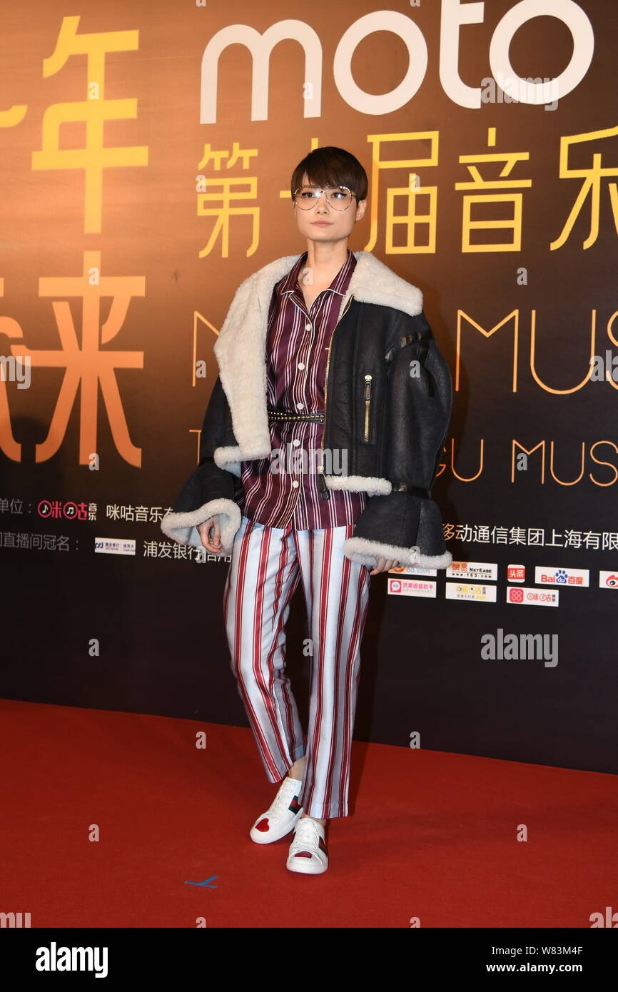 Chinese singer Chris Lee or Li Yuchun arrives on the red carpet for the ...