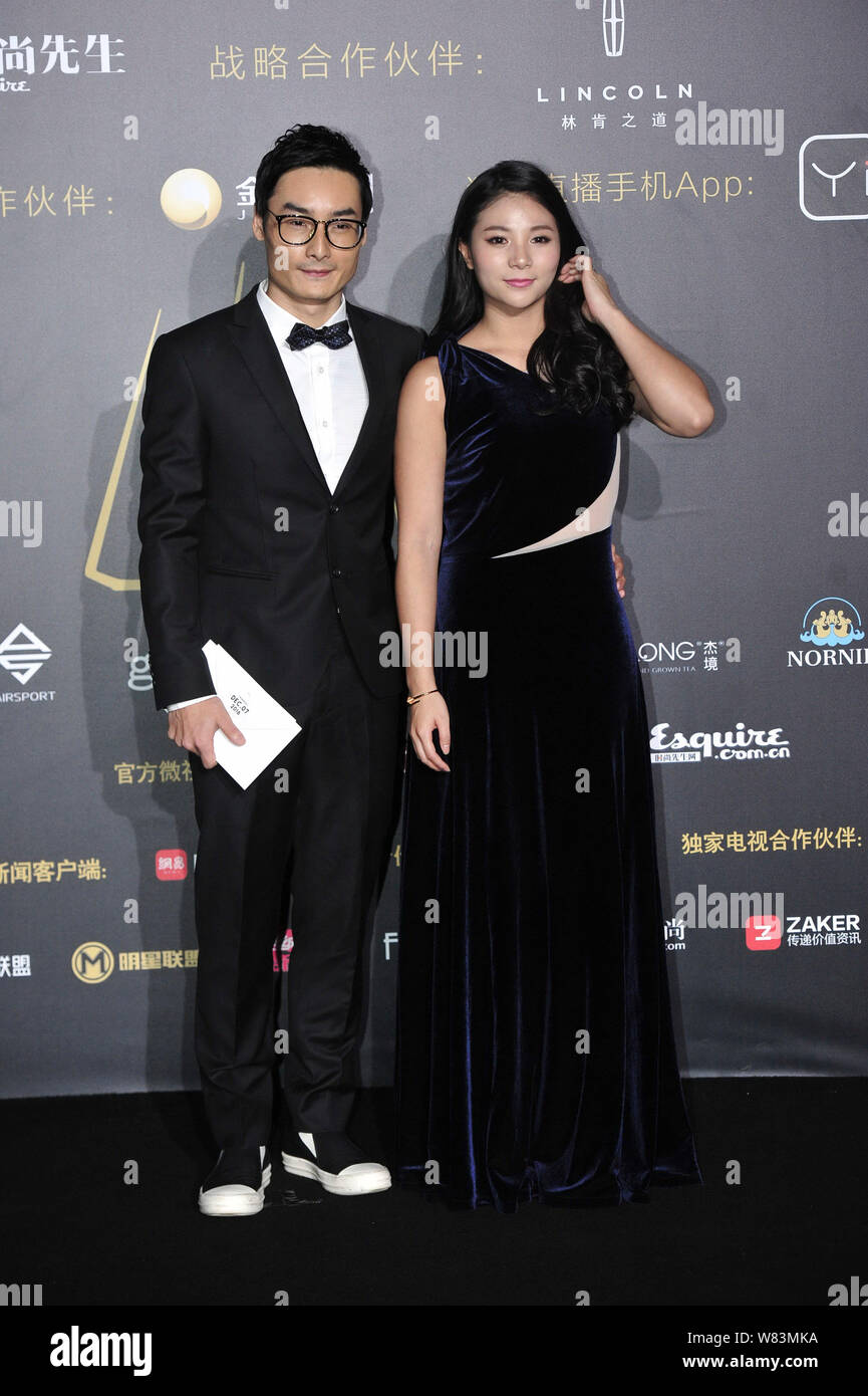 Chinese diving couple Qin Kai, left, and He Zi arrive on the red carpet ...