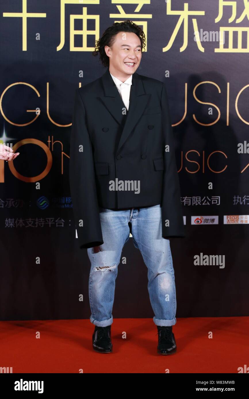 Hong Kong singer Eason Chan arrives on the red carpet for the 10th Migu ...