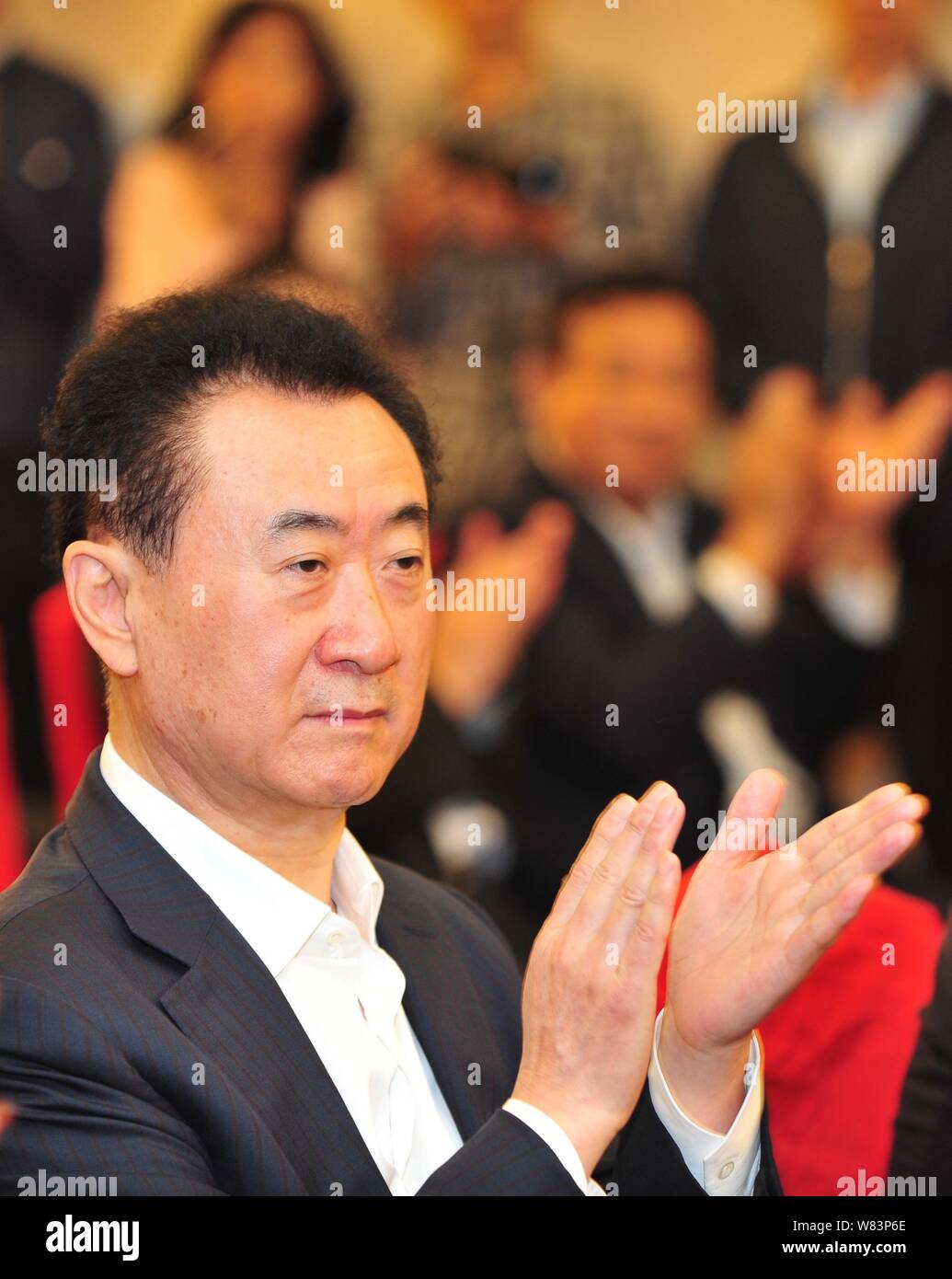 --FILE--Wang Jianlin, Chairman of Wanda Group, attends a signing ...