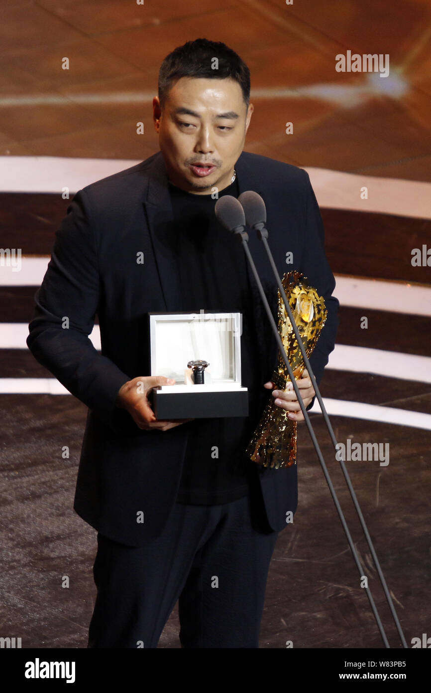 Chinese table tennis coach Liu Guoliang speaks after receiving the ...