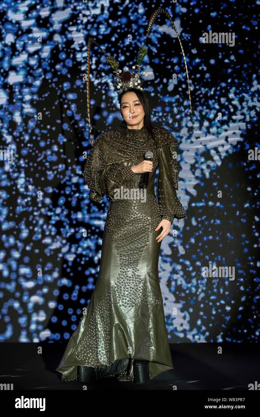 Chinese singer-songwriter Sa Dingding performs at a press conference to ...