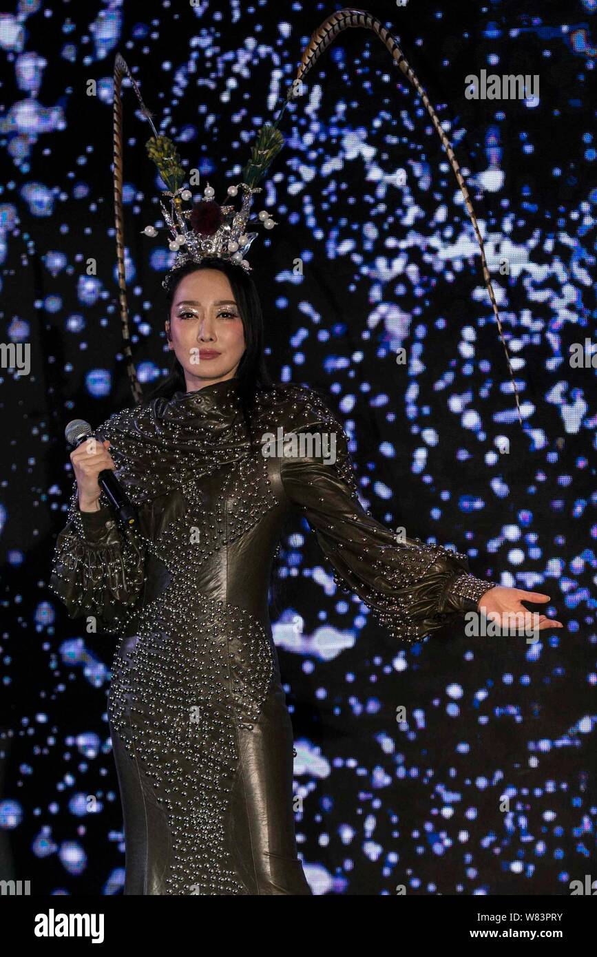 Chinese singer-songwriter Sa Dingding performs at a press conference to ...