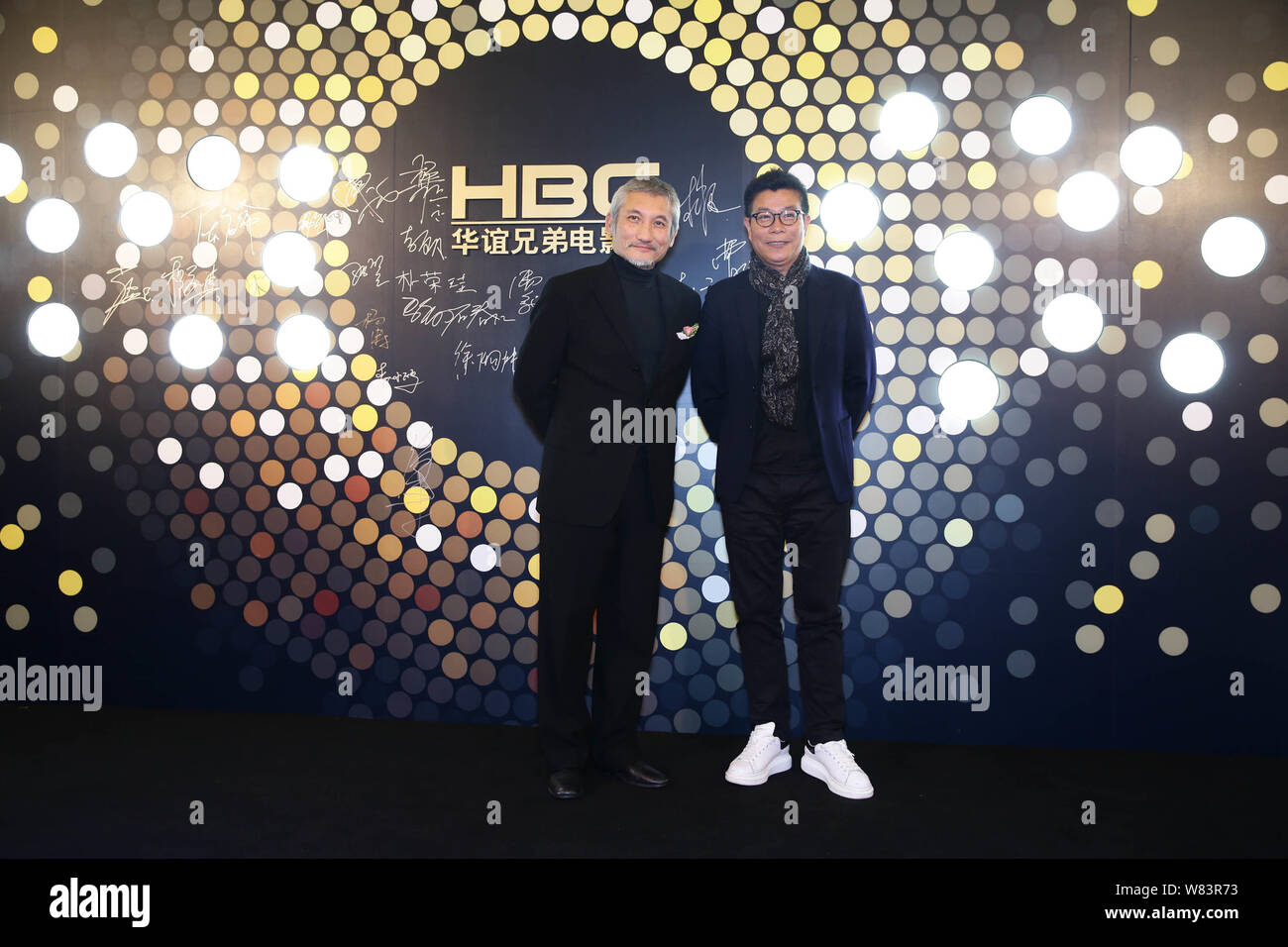 Hong Kong director Hark Tsui, left, and Wang Zhongjun, Chairman of ...