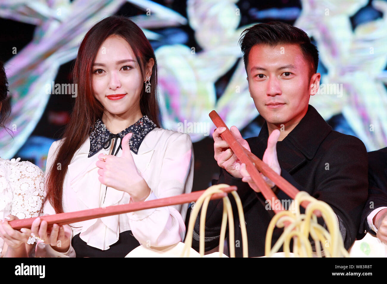 Hong Kong singer and actor Nicholas Tse, right, and Chinese actress ...