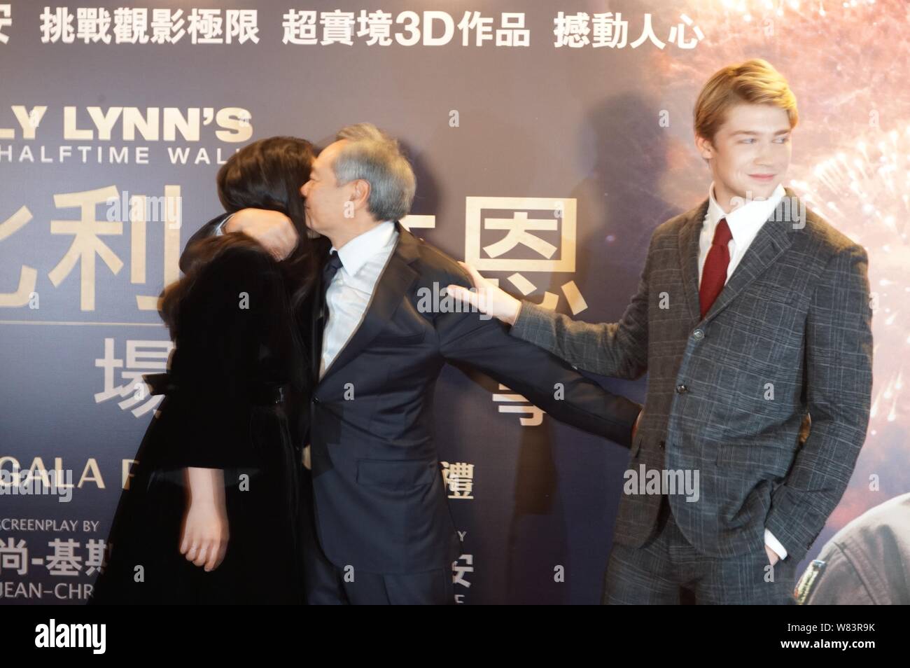 Taiwanese director Ang Lee, center, hugs Chinese actress Tang Wei at a ...