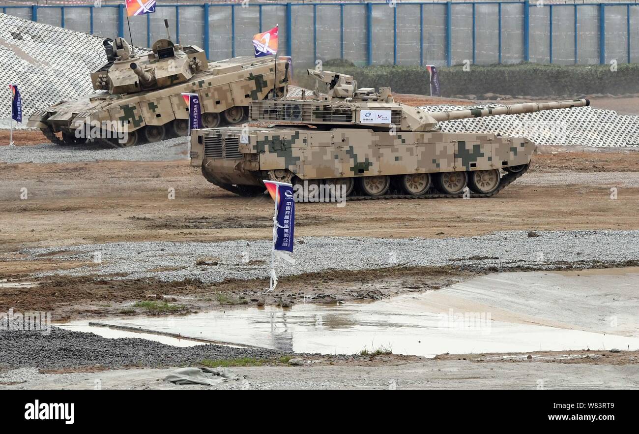 A Chinese-made VT2 tank, back, an export version of the Type 96G, and a ...