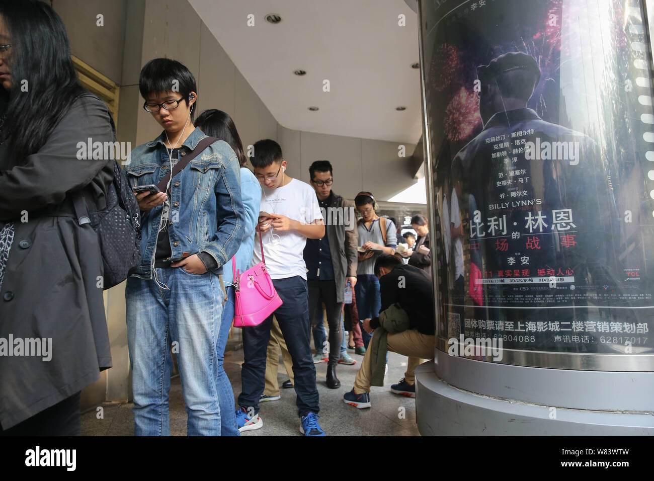 --FILE--Chinese filmgoers queue up to buy tickets of Taiwanese director ...