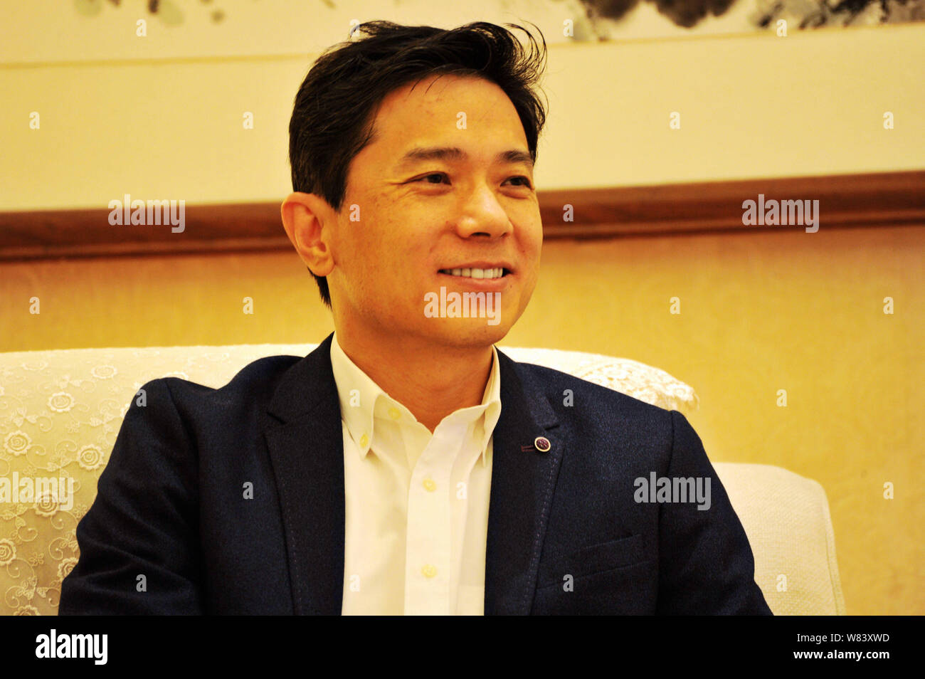 Robin Li Yanhong, Chairman and CEO of Baidu, attends a signing ceremony ...