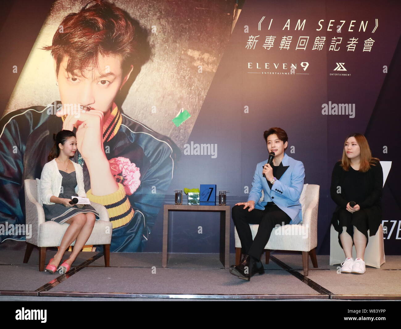 South Korean singer Choi Dong-wook, second right, better known by his ...