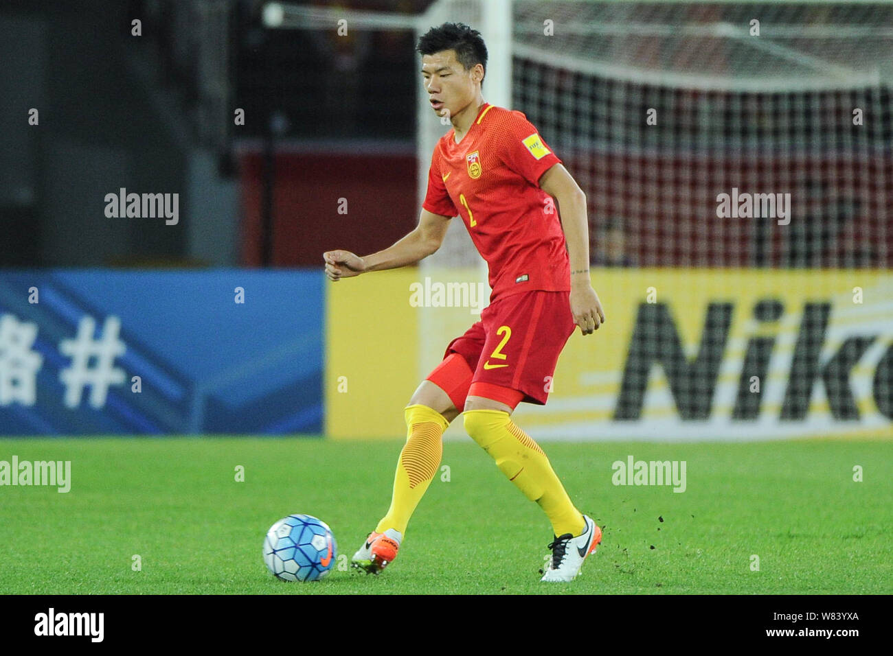 Mei Fang of China dribbles against Qatar in their Group A Round 3 match ...