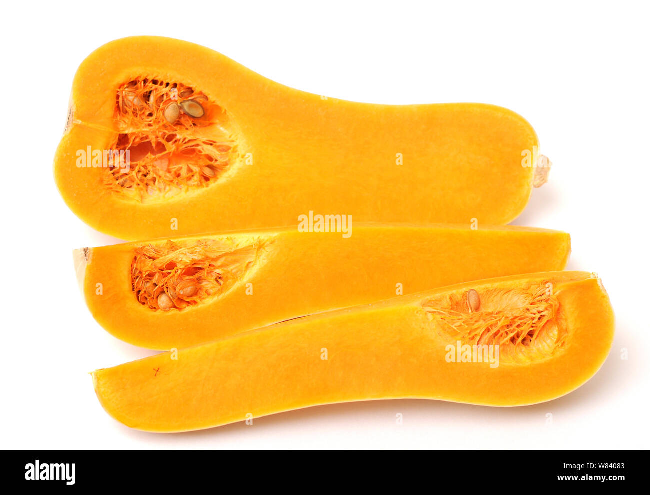 half and section butternut on white table Stock Photo - Alamy