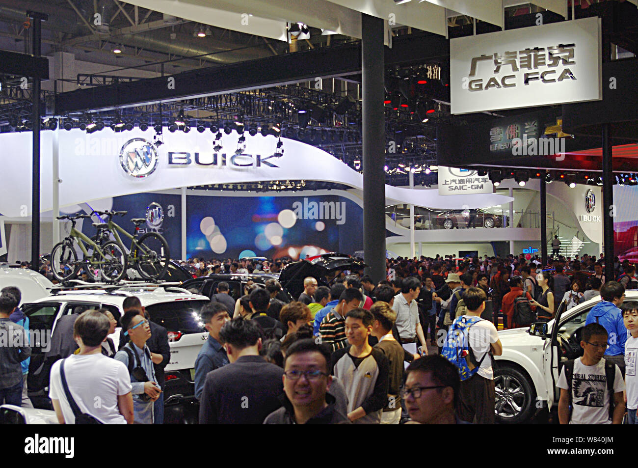 --FILE--Visitors crowd the stands of Buick and GAC FCA during the 14th ...