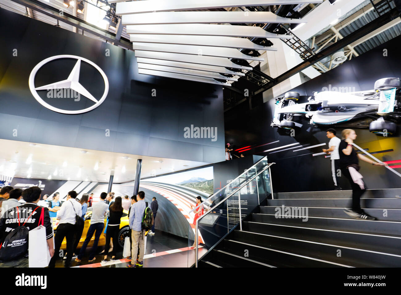 --FILE--People visit the stand of Mercedes-Benz during the 14th Beijing ...