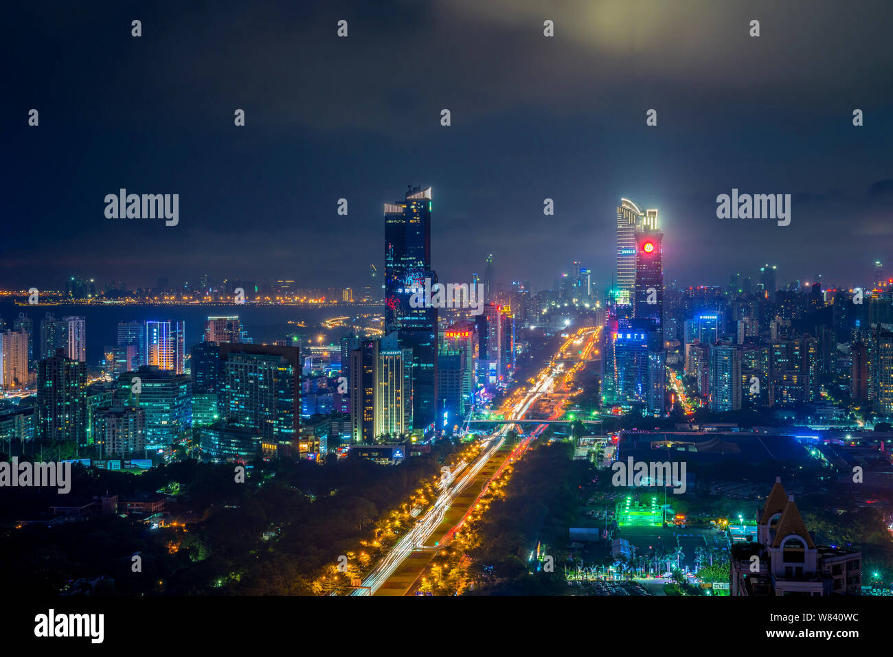 Night view of skyscrapers and high-rise buildings along Shennan Avenue ...