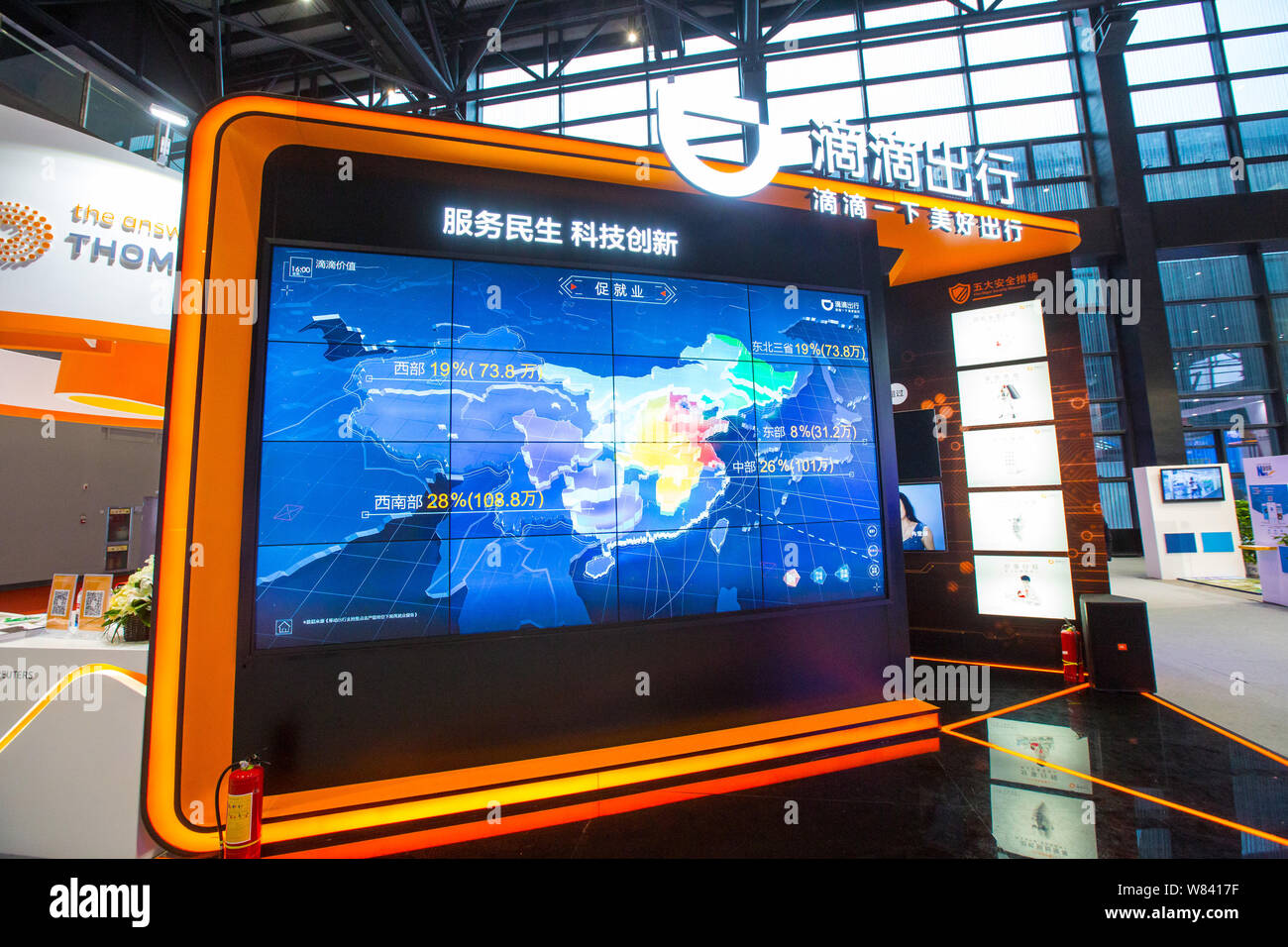View of the stand of taxi-hailing app Didi Chuxing at the Light of the ...