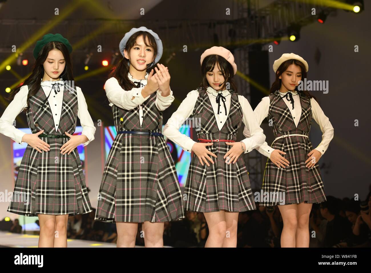 Members of Chinese girl group SNH48 perform during the SNH48 Fashion ...