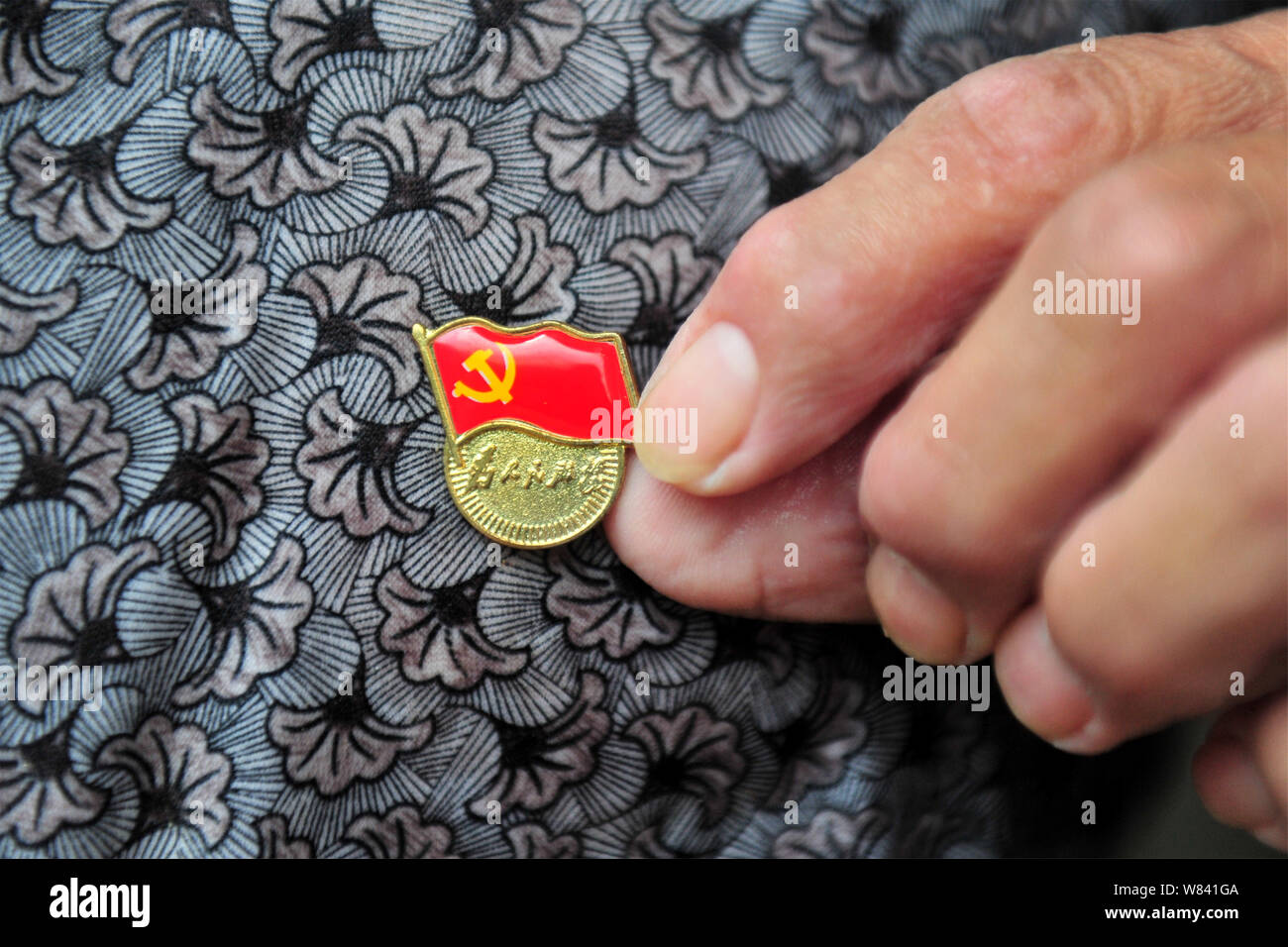 --FILE--A Chinese villager who is a member of the Communist Party of ...