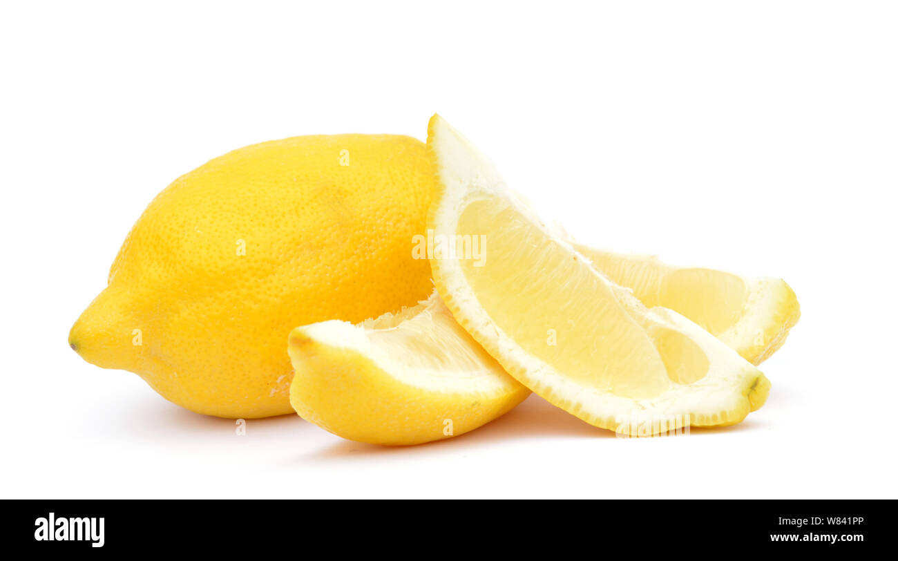 Whole and chopped lemon on white Stock Photo - Alamy