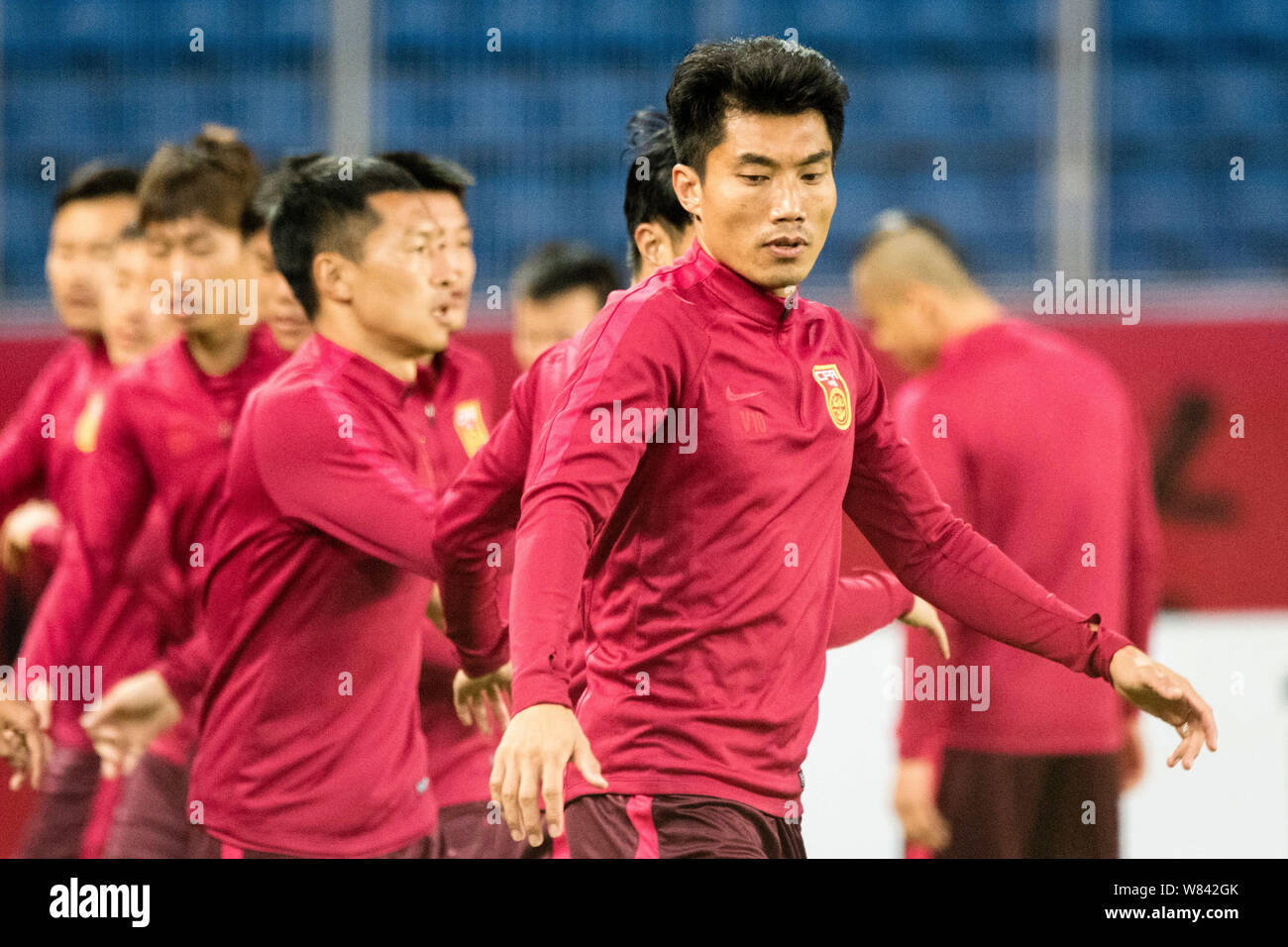 Players of the Chinese national men's football team practise during a ...