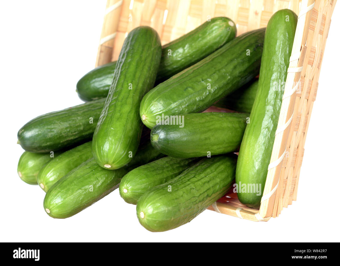 fresh green mini cucumber isolated on white Stock Photo - Alamy