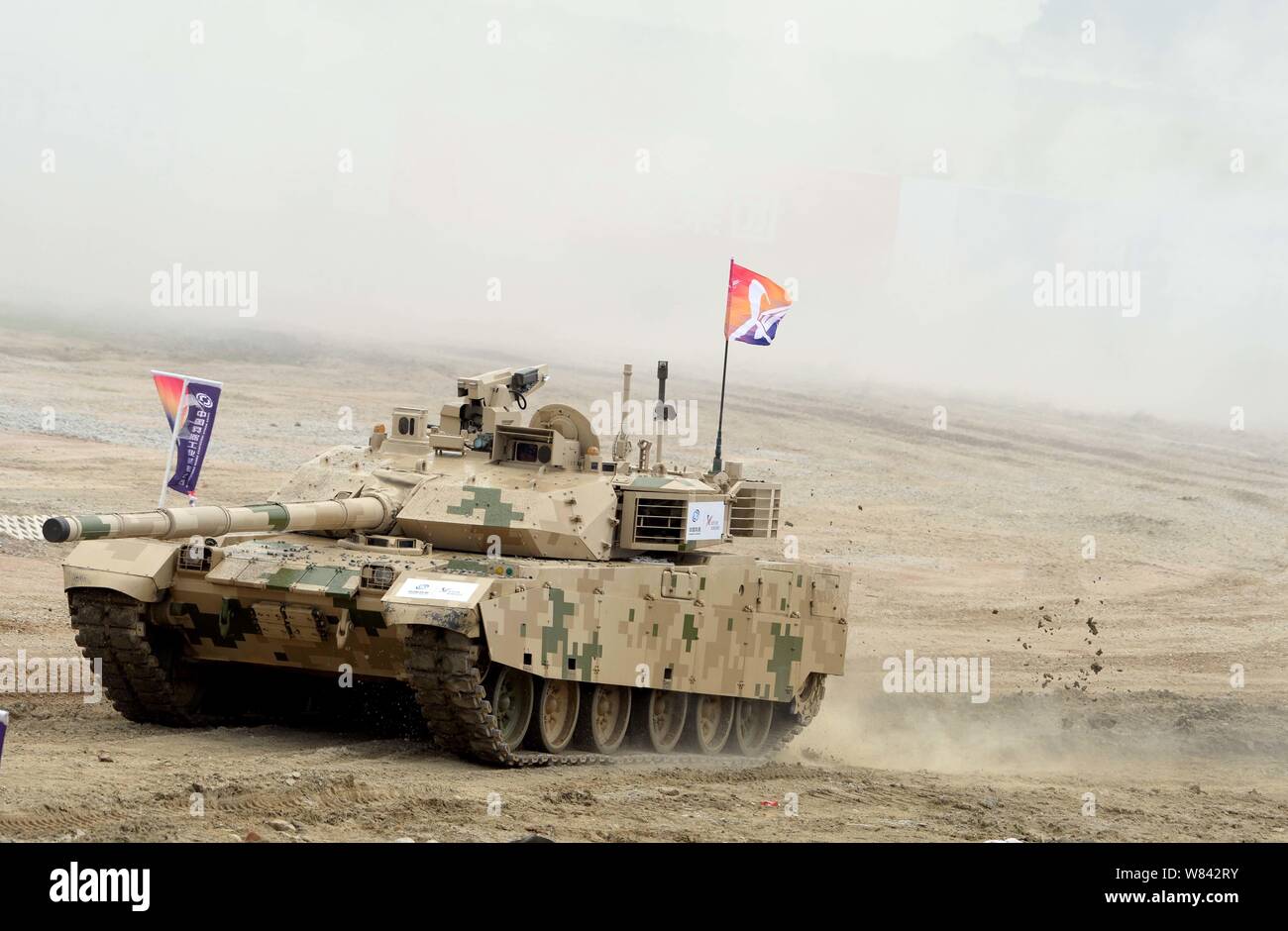 A VT4 tank, also known as the MBT3000, performs during 11th China ...
