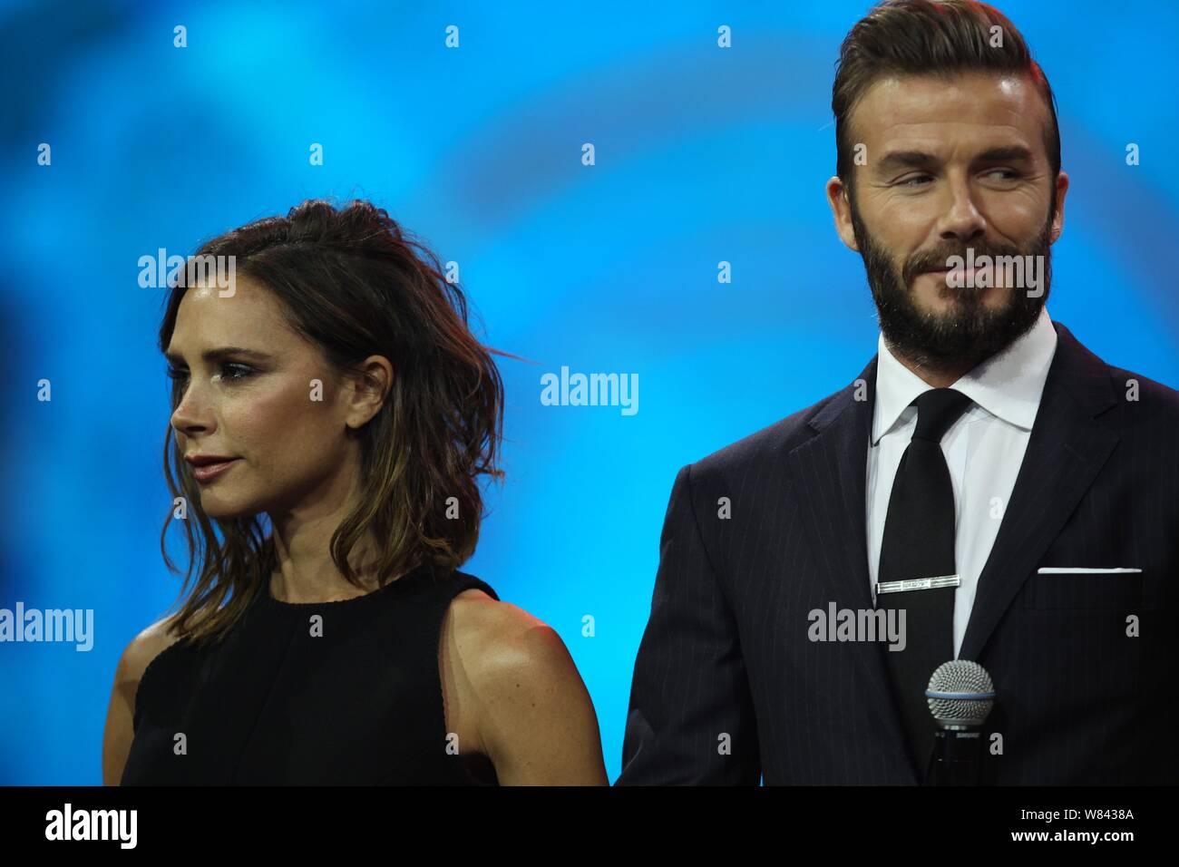 English football star David Beckham, right, and his wife Victoria ...