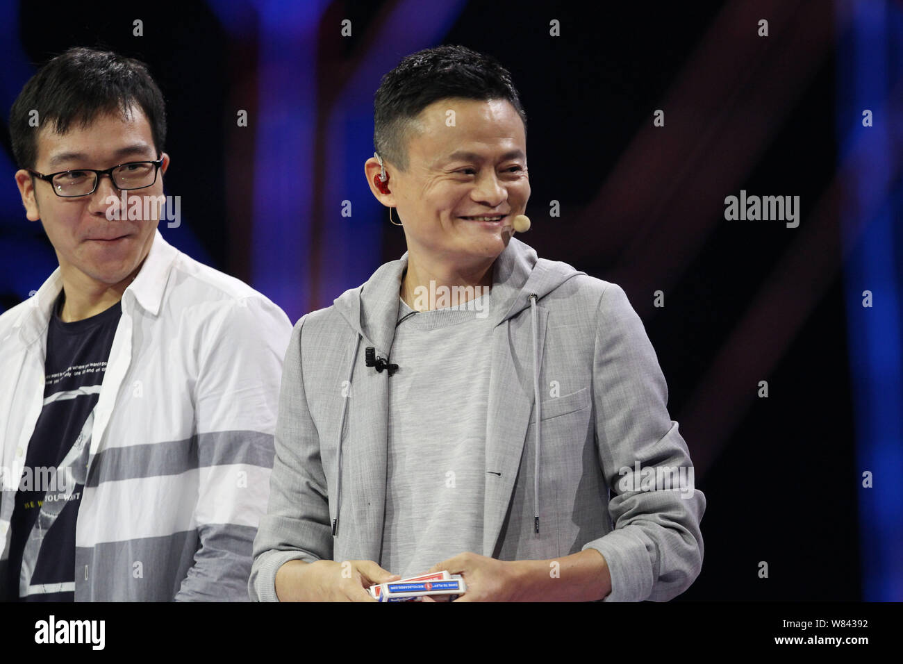 Jack Ma or Ma Yun, right, Chairman of Alibaba Group, performs a magic ...