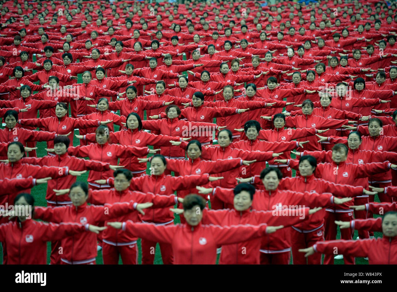 Local residents perform square dance during an attempt to set a new ...