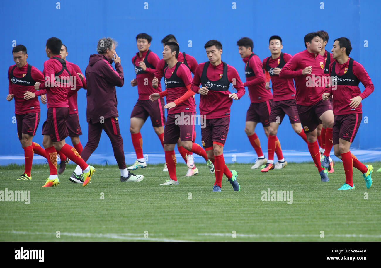 Footballers of the Chinese national men's football team take part in a ...