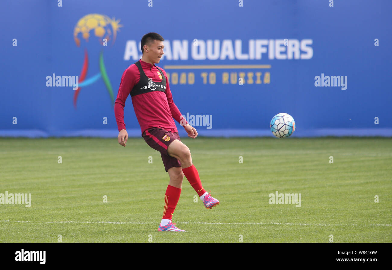 Footballer Yu Dabao of the Chinese national men's football team takes ...
