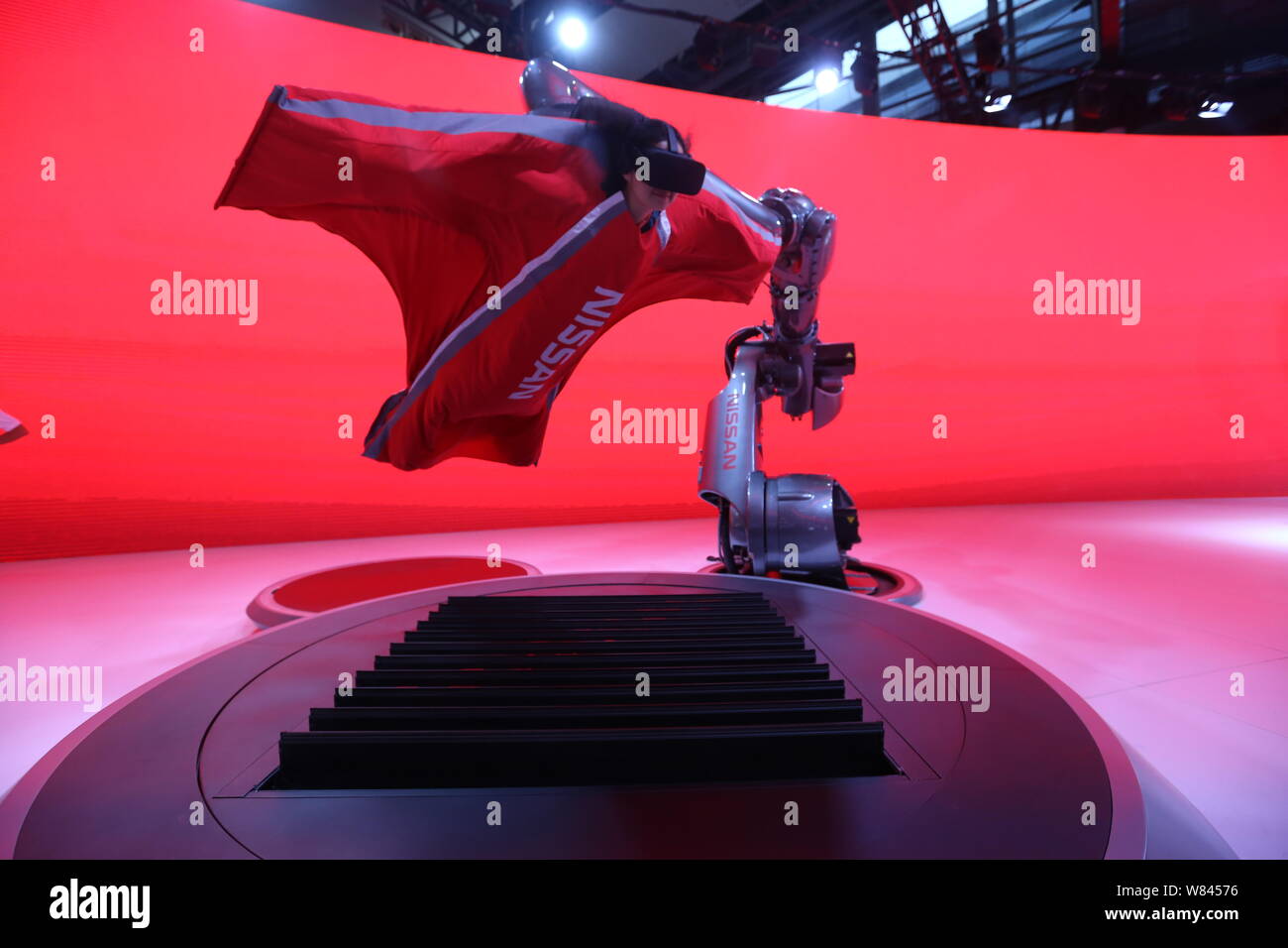 A visitor tries out a virtual reality (VR) device during the 14th China ...