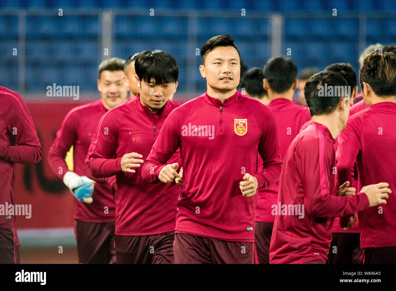 Players of the Chinese national men's football team practise during a ...