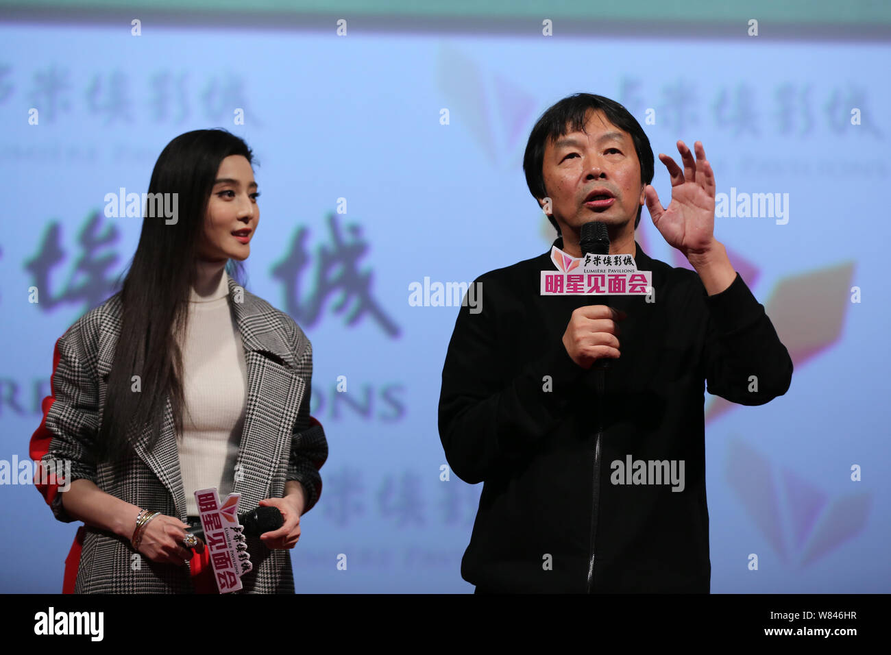 Chinese actress Fan Bingbing, left, and screenwriter Liu Zhenyun attend a promotional event for ...