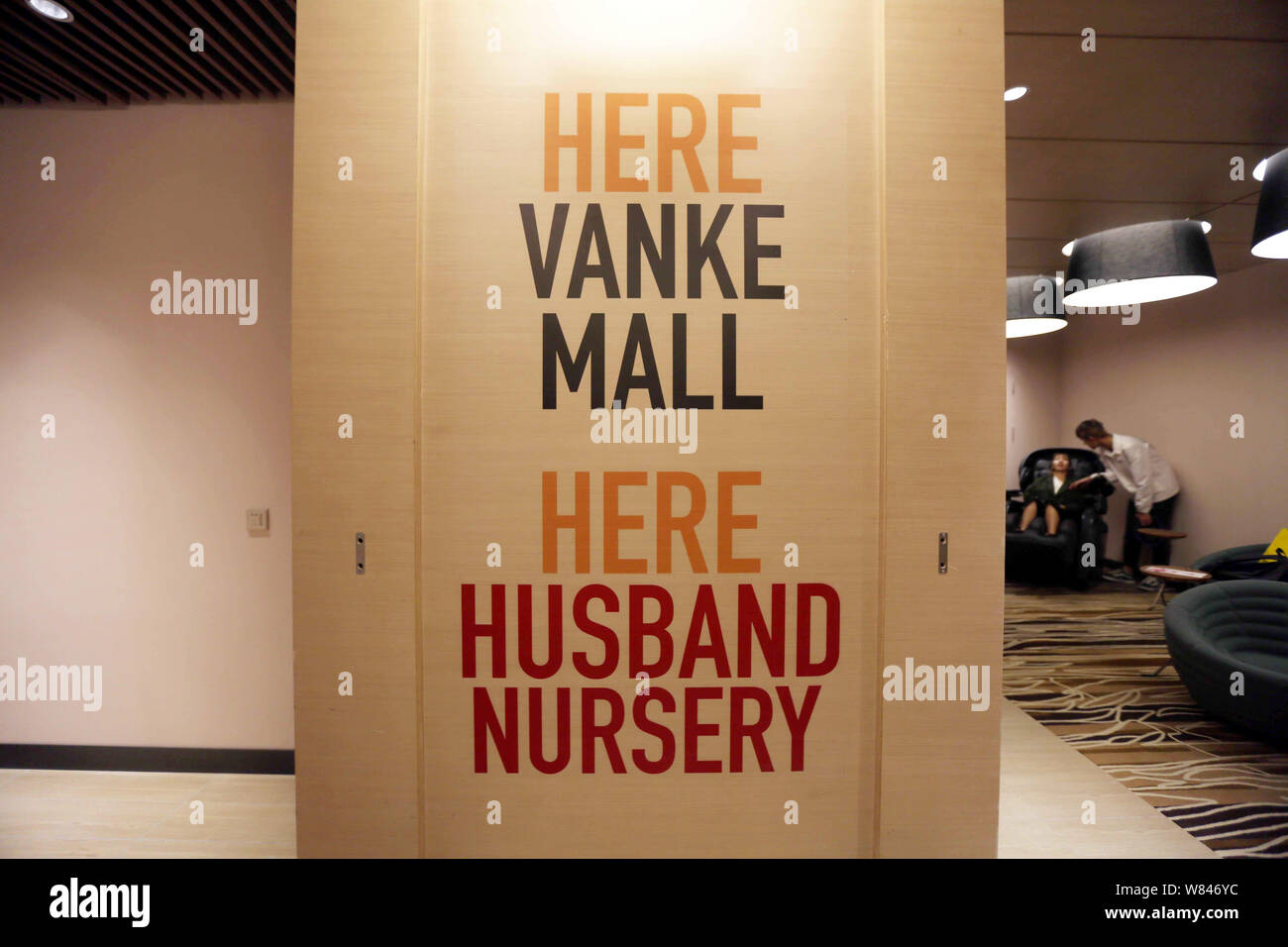 Shoppers rest in the husband nursery at Vanke Mall in Qibao town ...