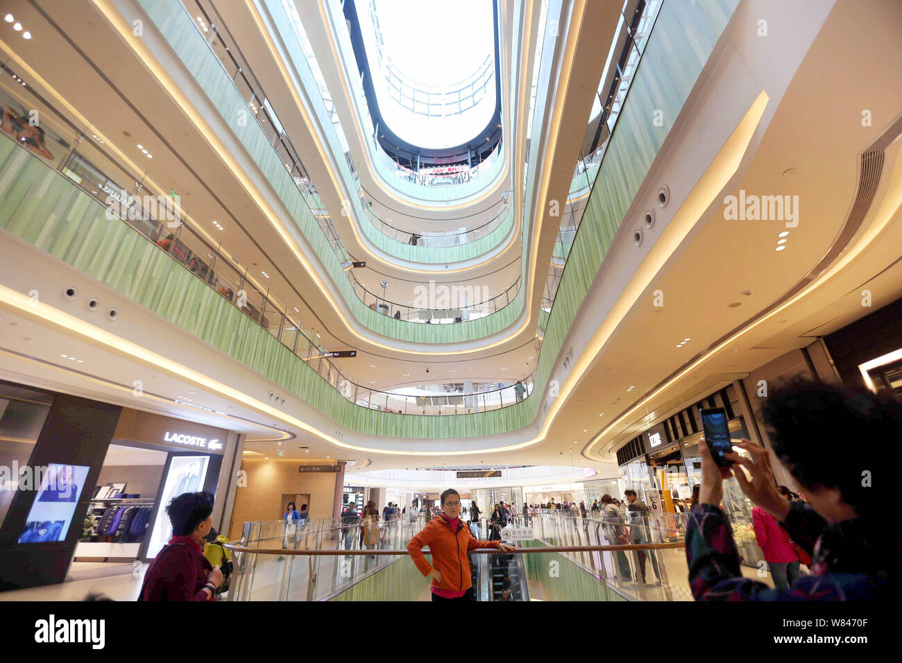 People are shopping at Vanke Mall in Qibao town, Shanghai, China, 2 ...