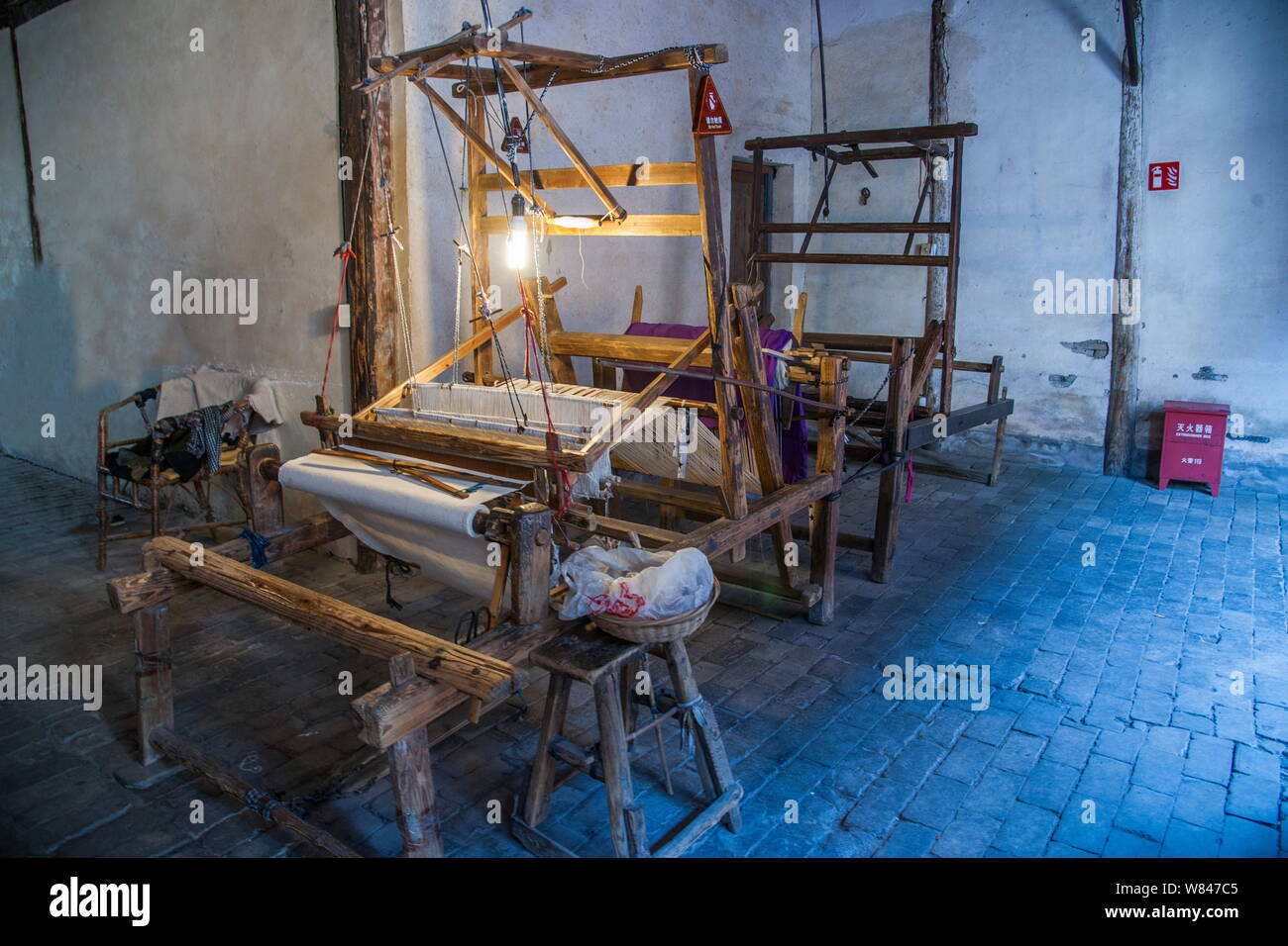 View of an old-fashioned loom at a dyehouse in Wuzhen town, Tongxiang ...