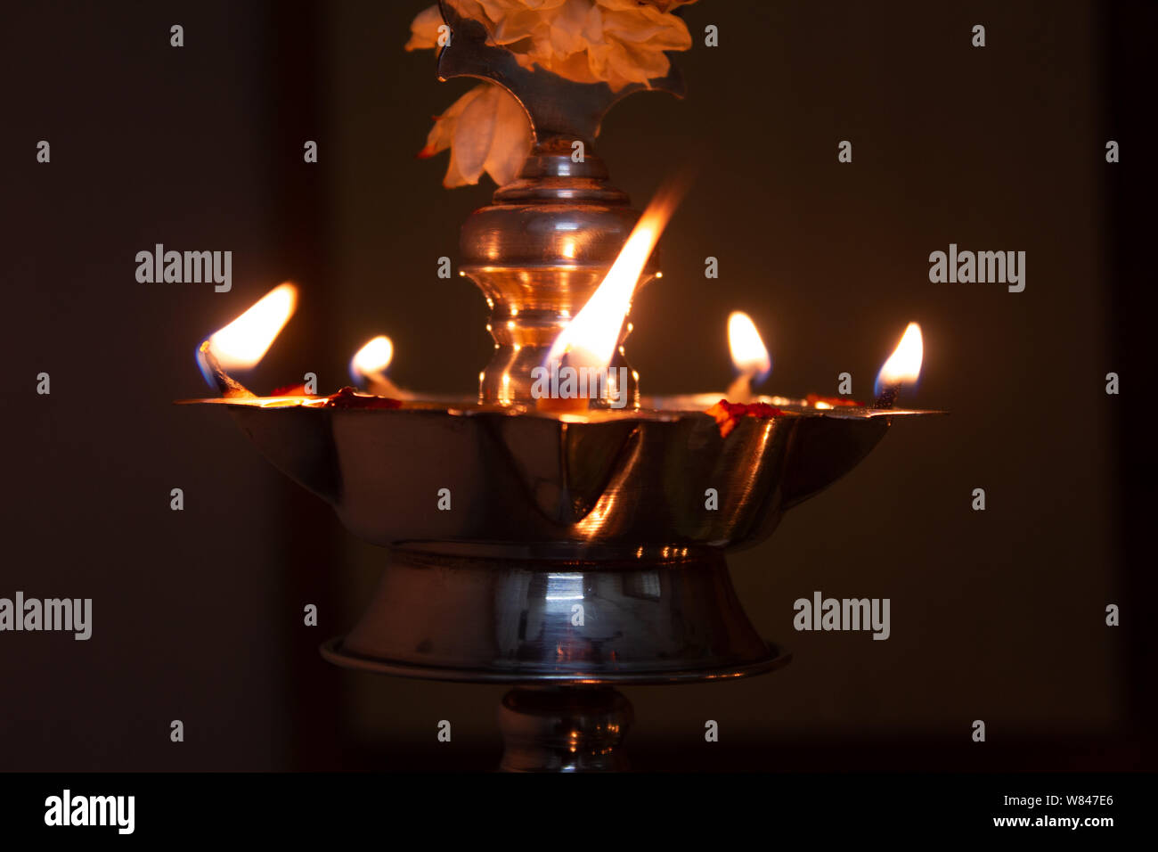 Sacred diya offering during holy hi-res stock photography and images ...