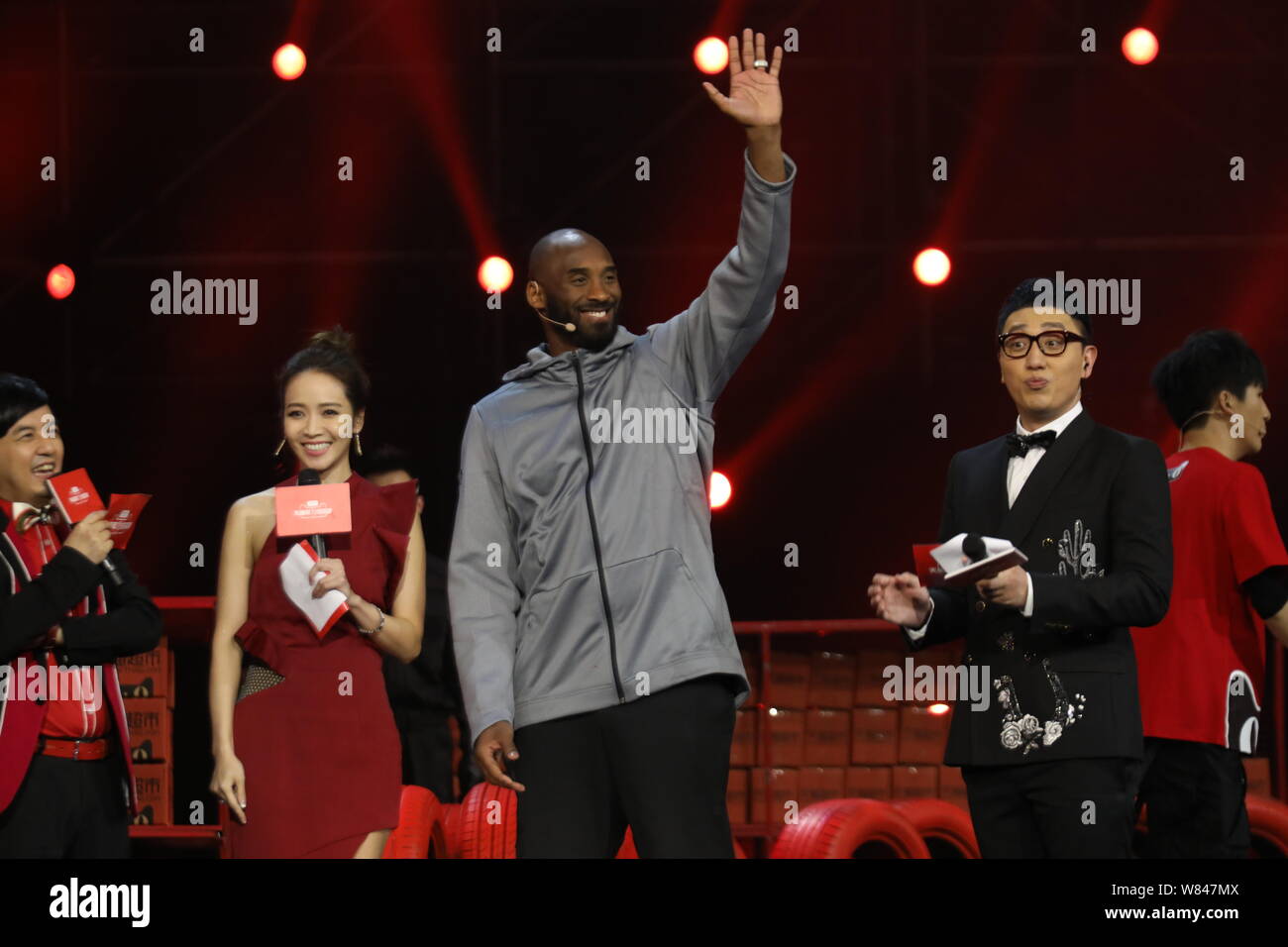 NBA star Kobe Bryant, center, attends a gala for the Tmall 11.11 Global Shopping Festival 2016 ...