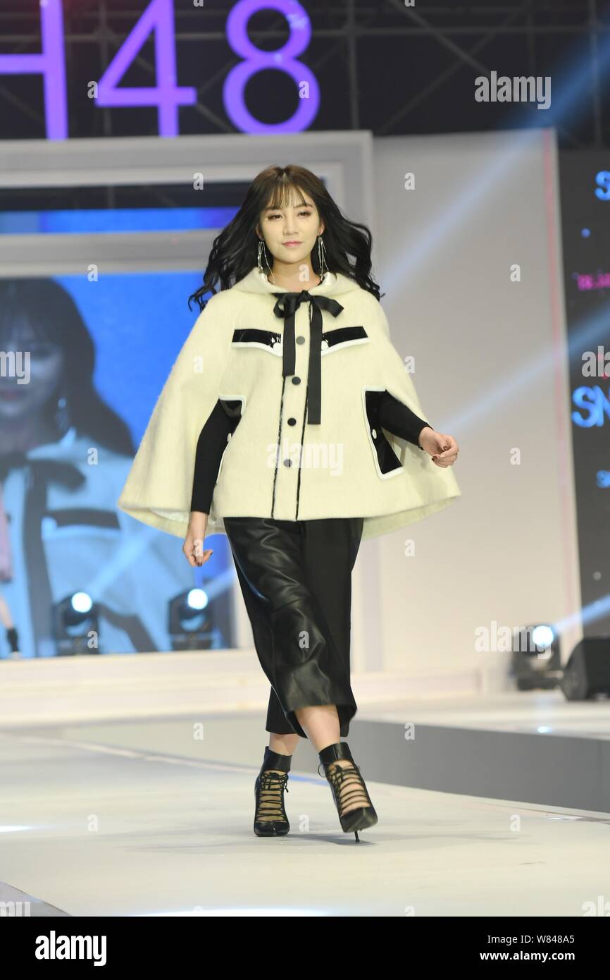 A member of Chinese girl group SNH48 parades during the SNH48 Fashion ...