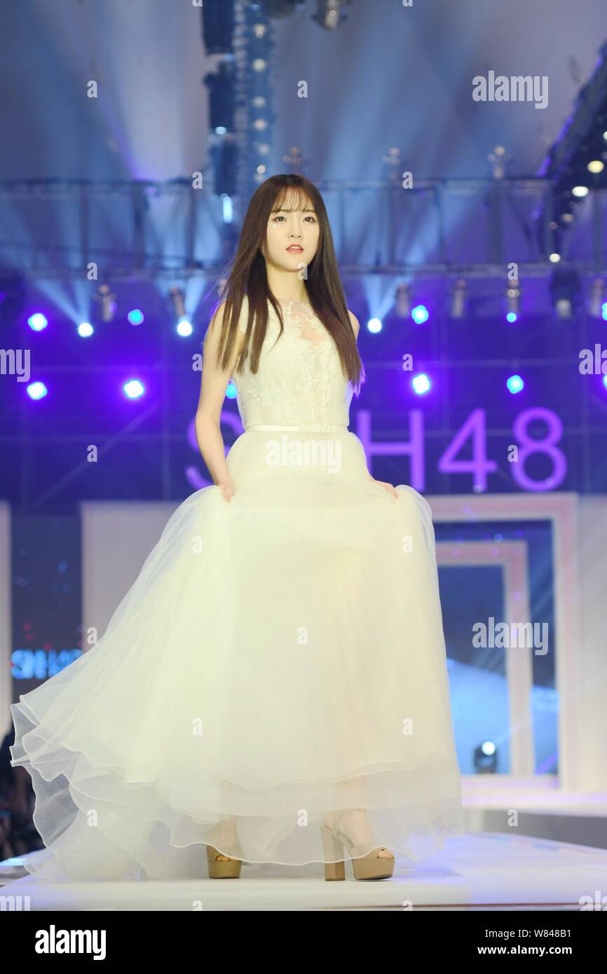 A member of Chinese girl group SNH48 parades during the SNH48 Fashion ...