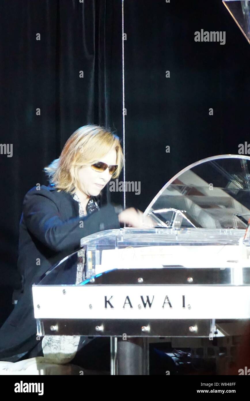 Yoshiki Hayashi of Japanese rock band X Japan performs at a press ...