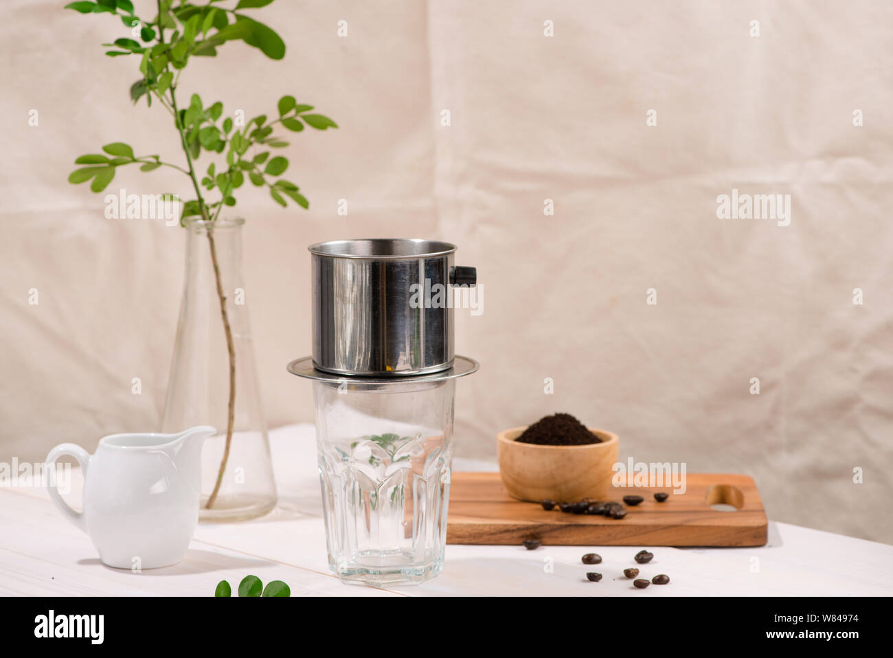 Vietnamese coffee Phin on light background Stock Photo - Alamy
